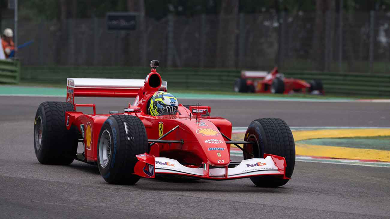 F2004 among twenty Ferrari F1 cars on track at Mugello